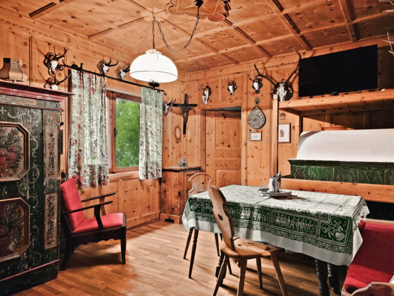 Chalet Am Reschensee: Enjoy Cozy Charm at a Lakeside Tyrolean Hunting ...